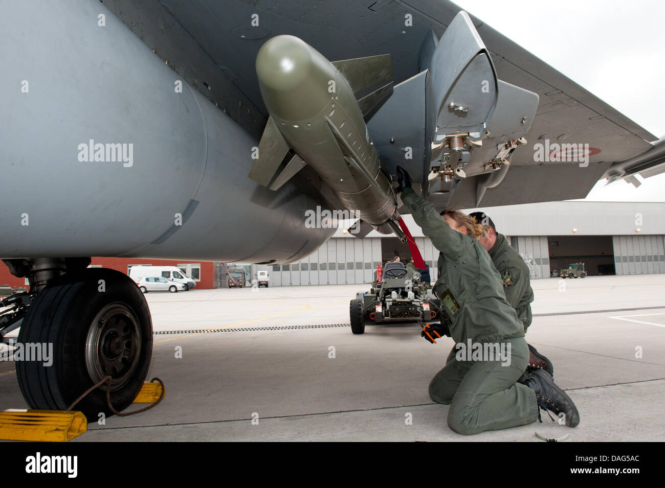 Engineers go through last checkups at the Rafale Jet on a French ...