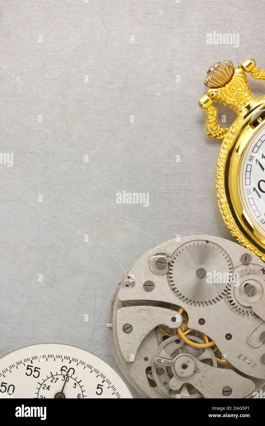 watch mechanism at metal background texture Stock Photo - Alamy