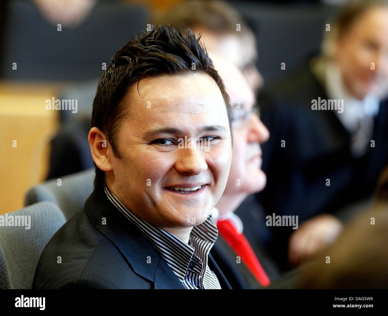 Ante Sapina, accused of organised fraud, smiles in the dock as his ...