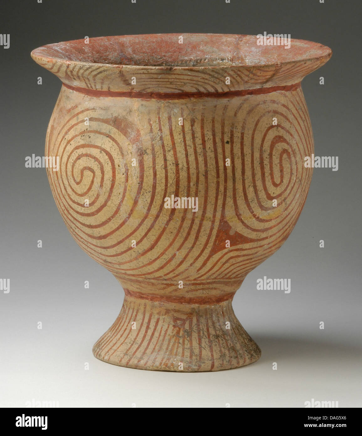 This pot, featuring concentric swirl patterns, is a significant example ...
