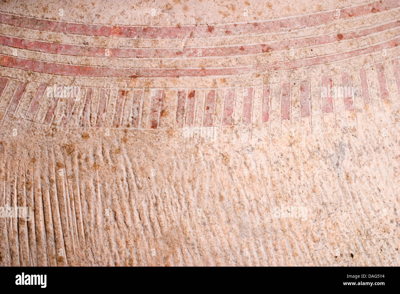 This ceramic pot, featuring a slightly flaring rim, is part of the ...