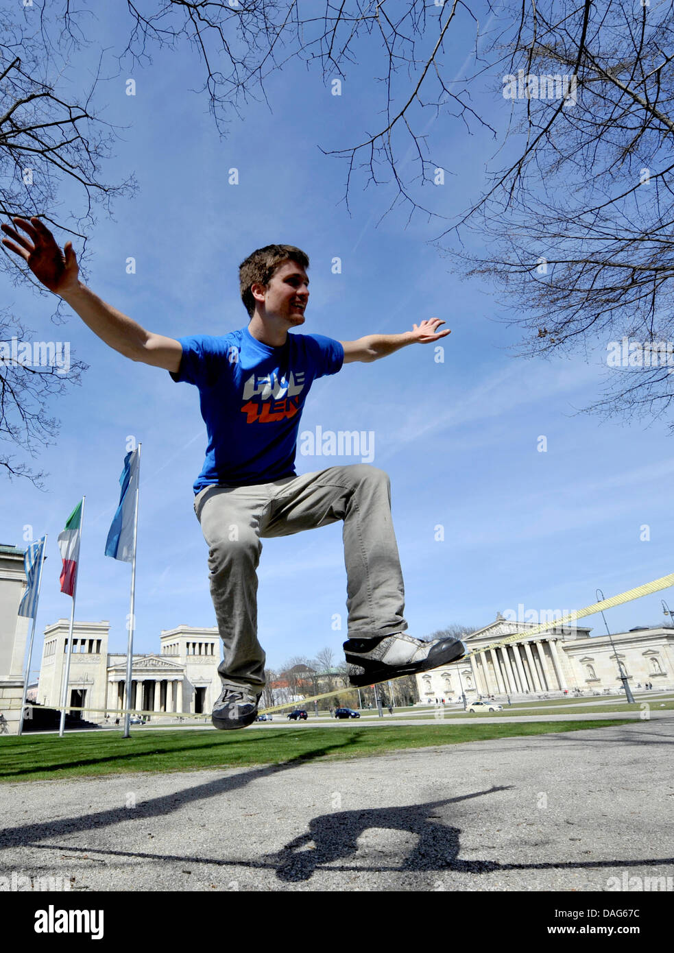 A boy balances on a slackline on Koenigsplatz in Munich, Germany, 22 ...