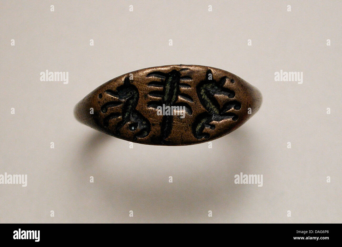 This ring, crafted from fine materials, showcases intricate design ...