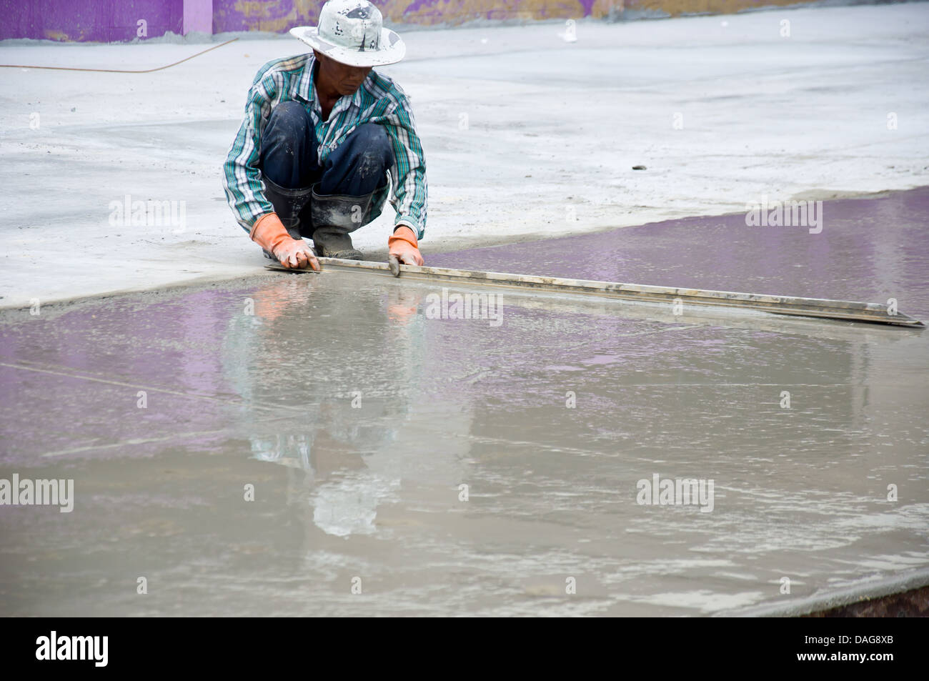 worker for floor construction Stock Photo - Alamy