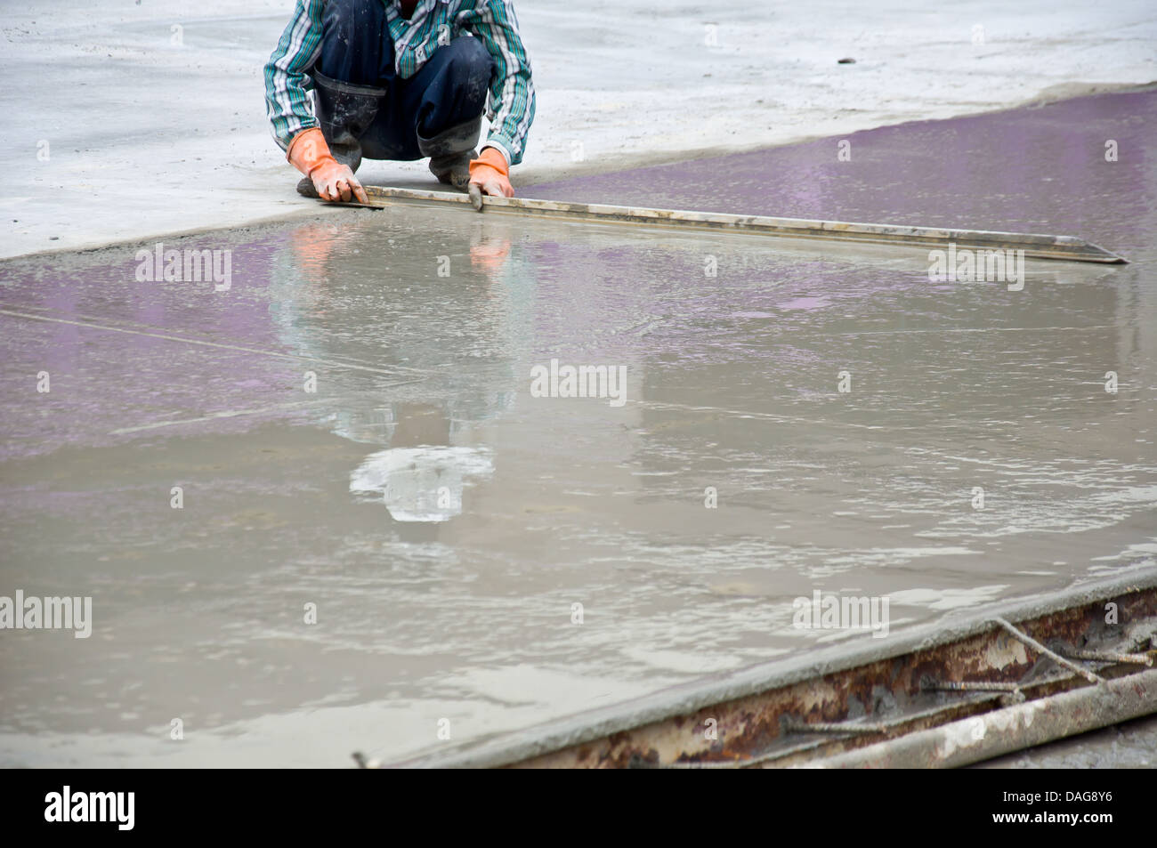 worker for floor construction Stock Photo - Alamy