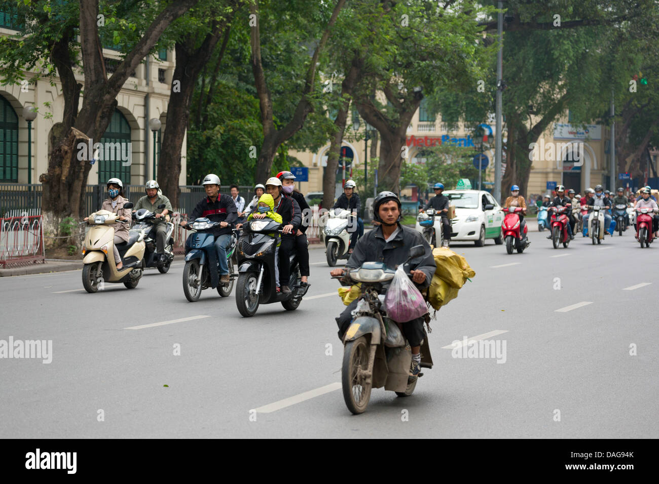 Scooter Drivers in Hanoi, Vietnam Stock Photo - Alamy