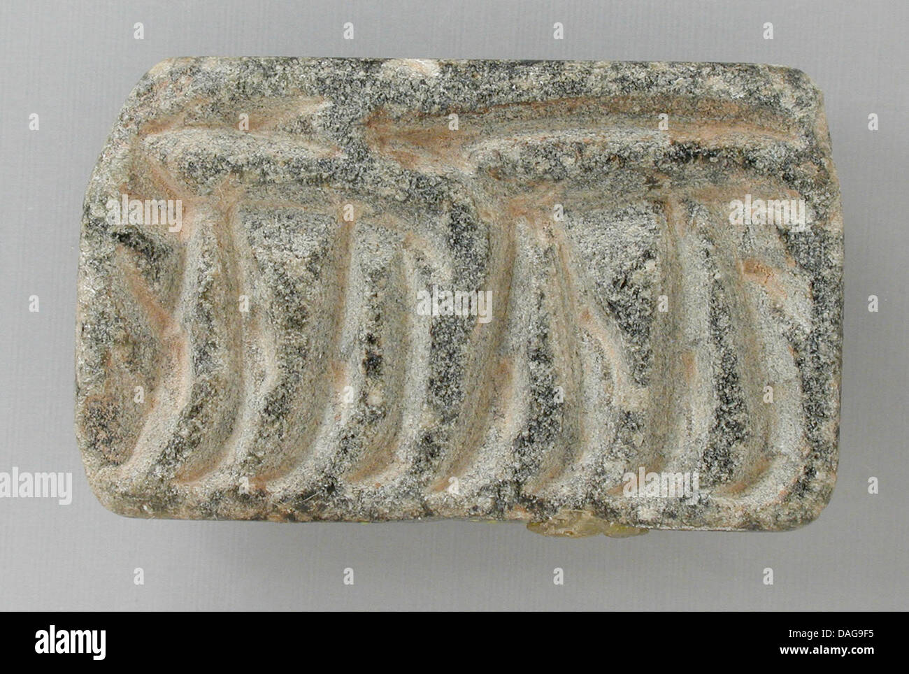 This gabled stamp features a rounded back, highlighting the unique ...