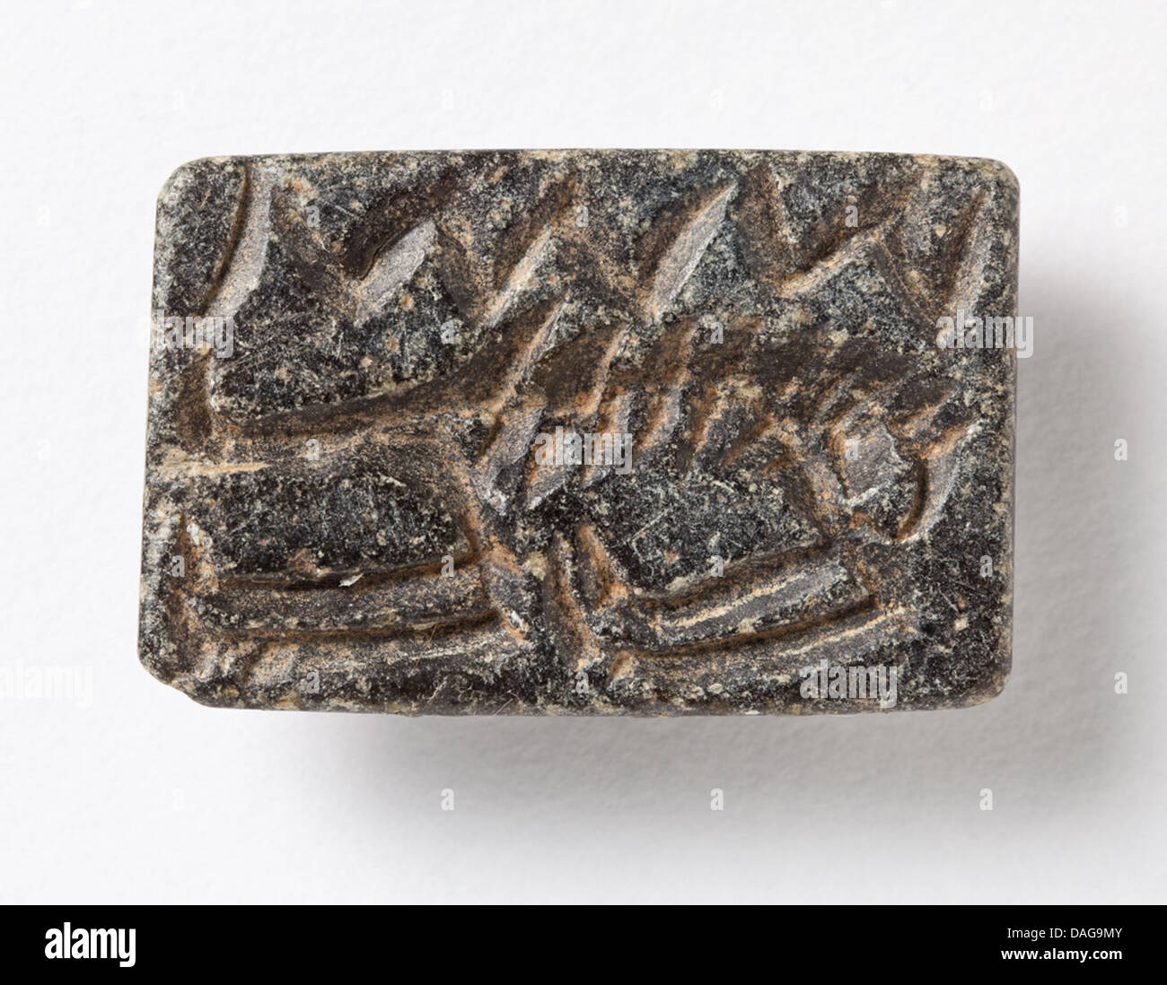 The gabled stamp seal, part of the LACMA collection, is an ancient ...