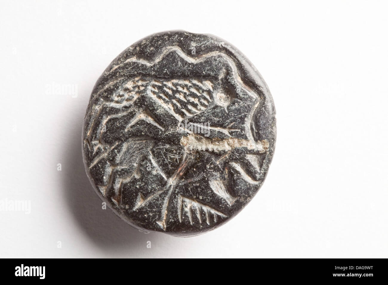 This hemispheroid stamp seal, crafted in bronze, features intricate ...