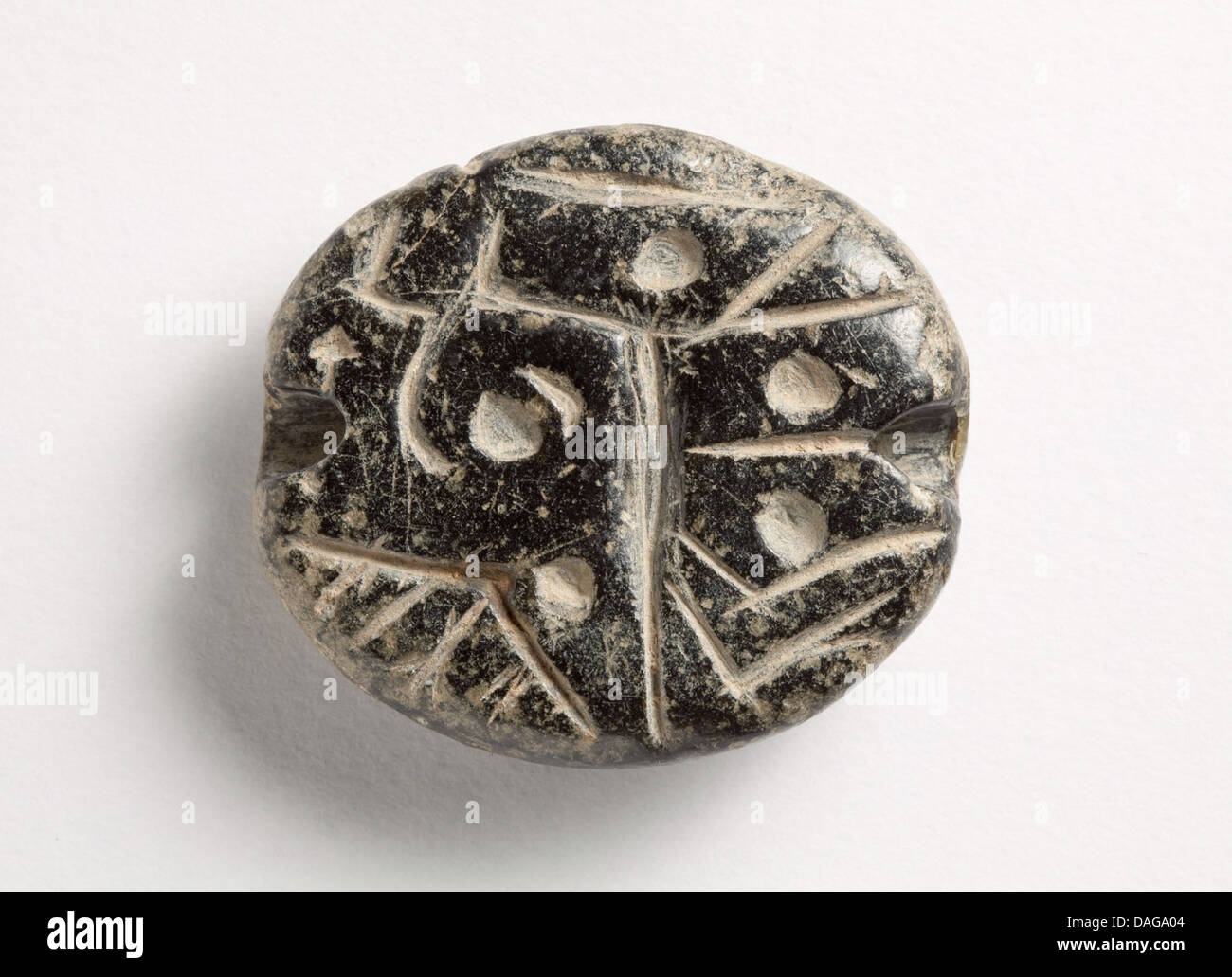 This hemispheroid stamp seal is a well-preserved example of ancient ...