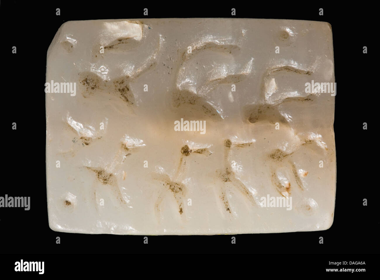 This tabloid stamp seal represents an ancient sealing technique, used ...