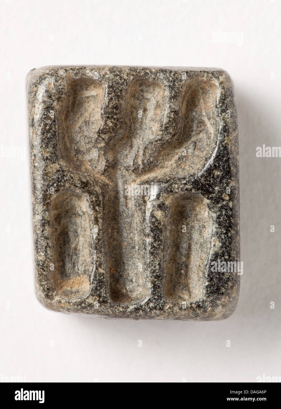 This tabloid-style stamp seal features intricate designs that served as ...