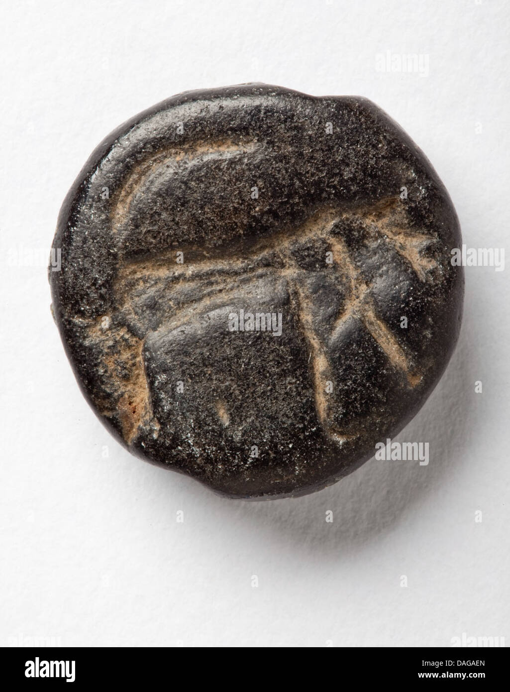 This ancient stamp seal features intricate design, used historically ...