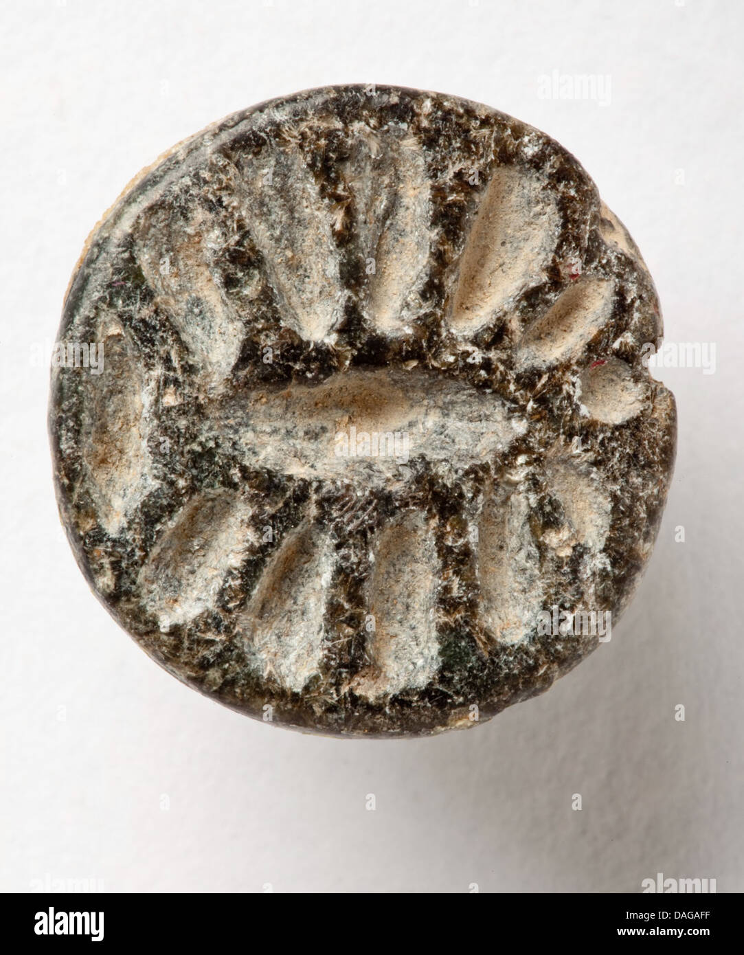 This stamp seal, used for imprinting designs or markings in ancient ...