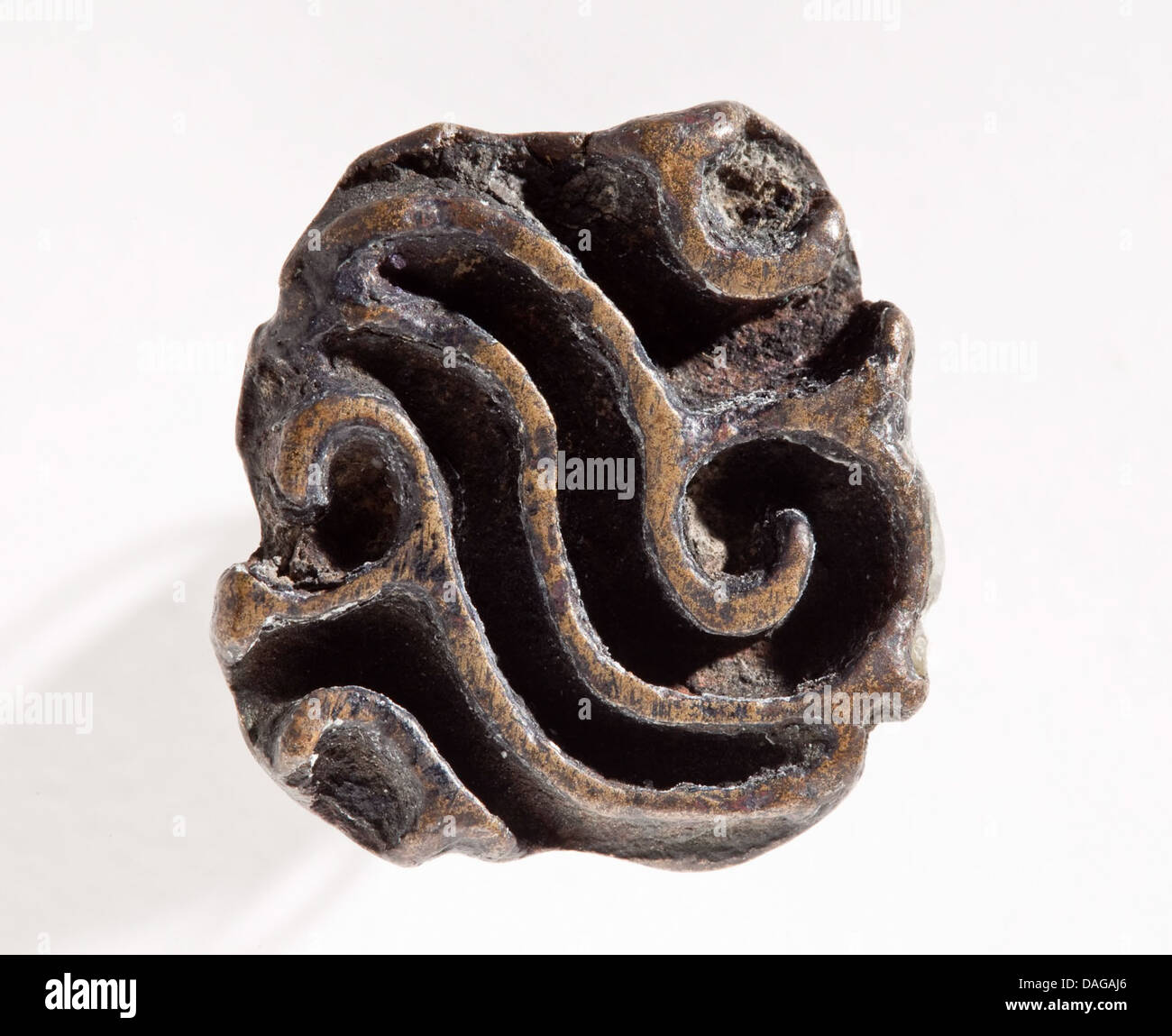 This ancient stamp seal features intricate engravings, likely used for ...