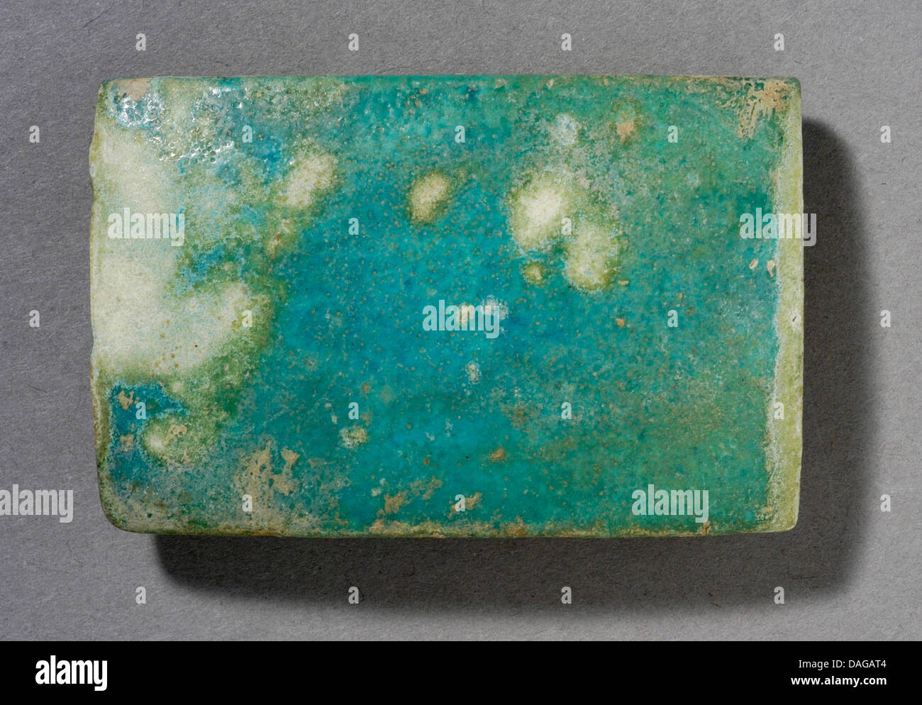 This decorative tile features intricate patterns, representing the ...