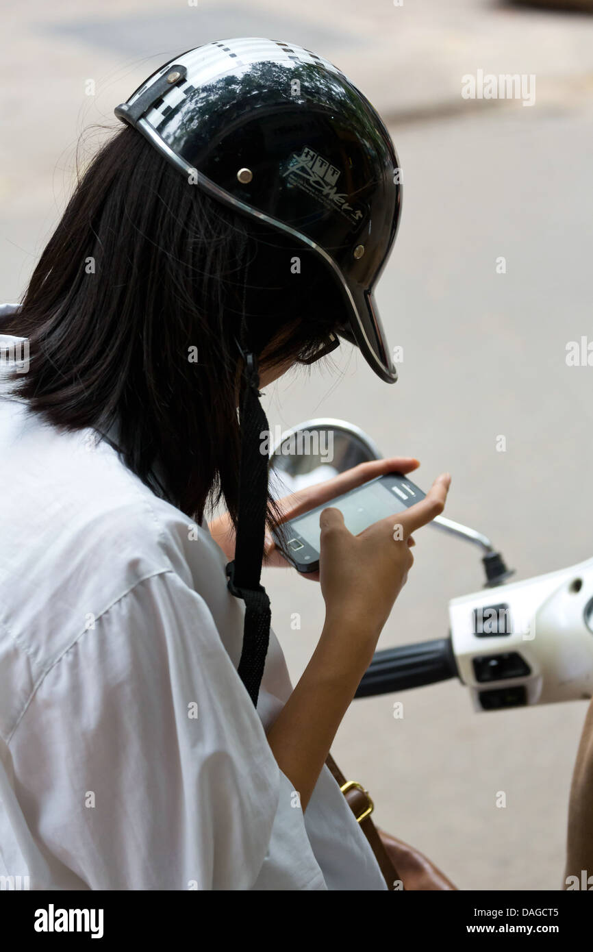 Vietnamese woman smartphone in hi-res stock photography and images - Alamy