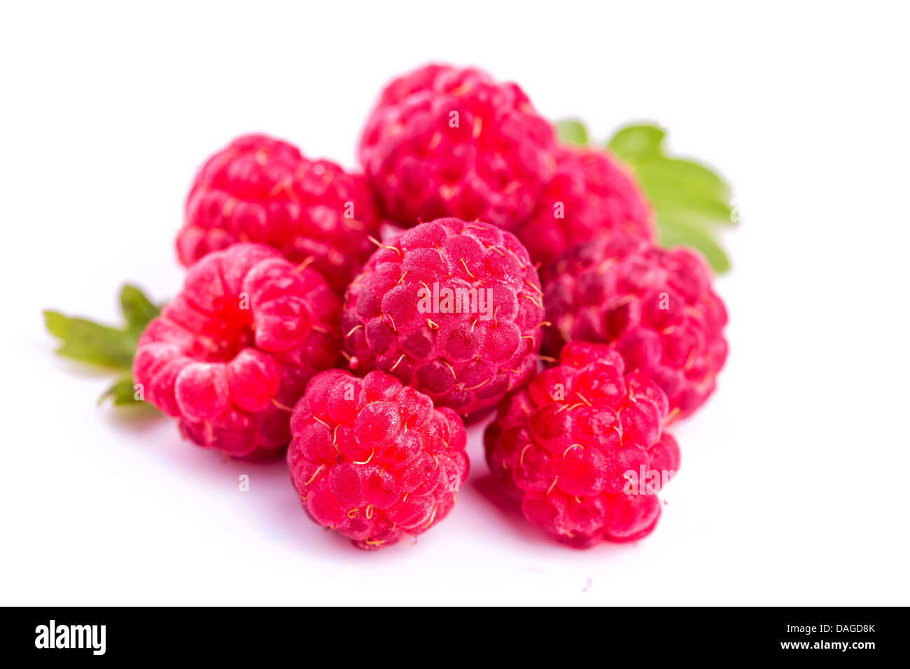Ripe raspberries isolated on a white background Stock Photo - Alamy