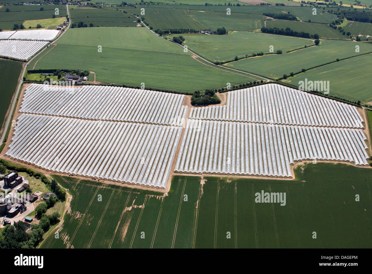 AERIAL VIEW OF COMMERCIAL POLYTUNNELS IN THE COUNTRYSIDE Stock Photo ...
