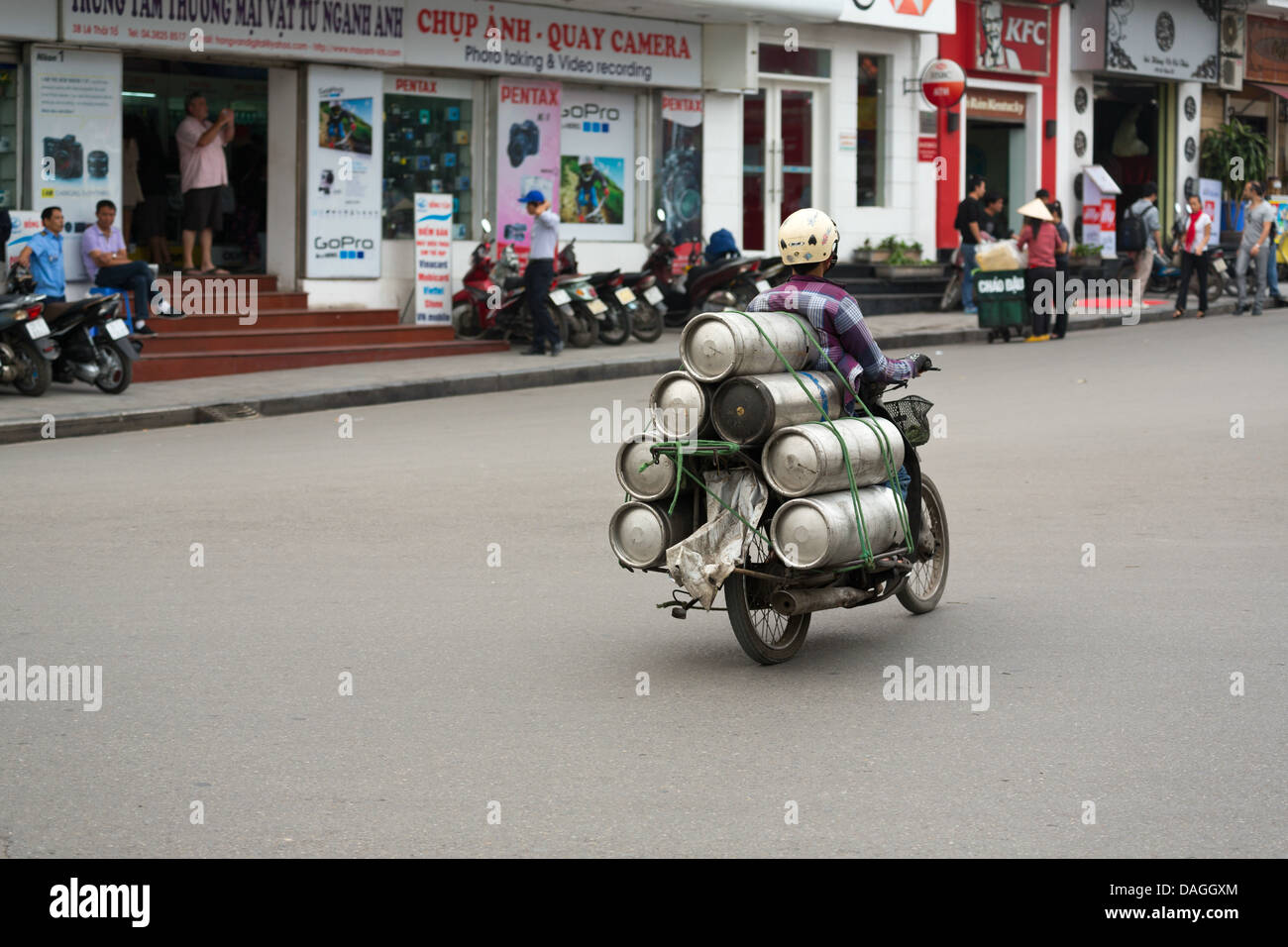Scooter Drivers in Hanoi, Vietnam Stock Photo - Alamy