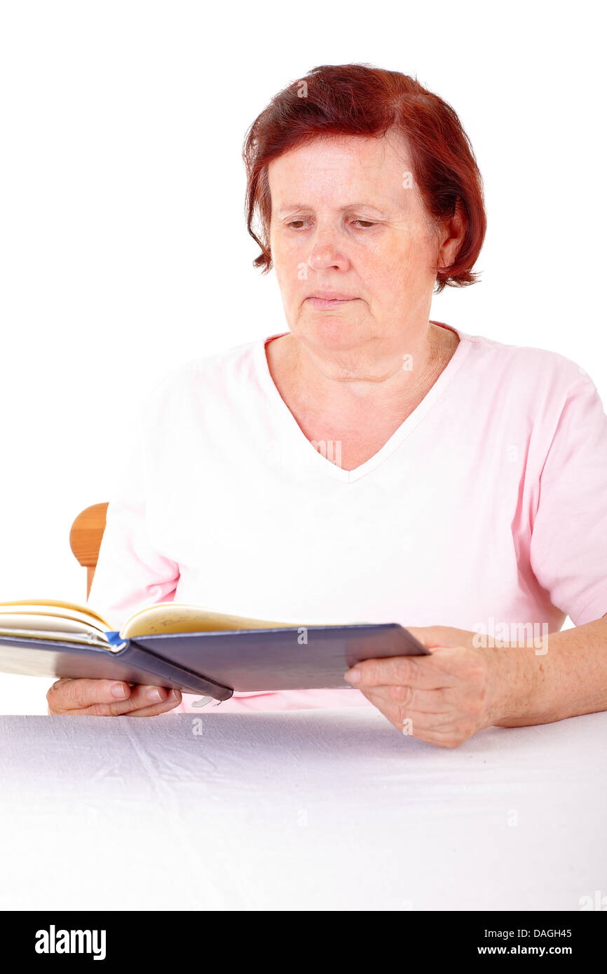 Woman portrait reading paperwork hi-res stock photography and images ...