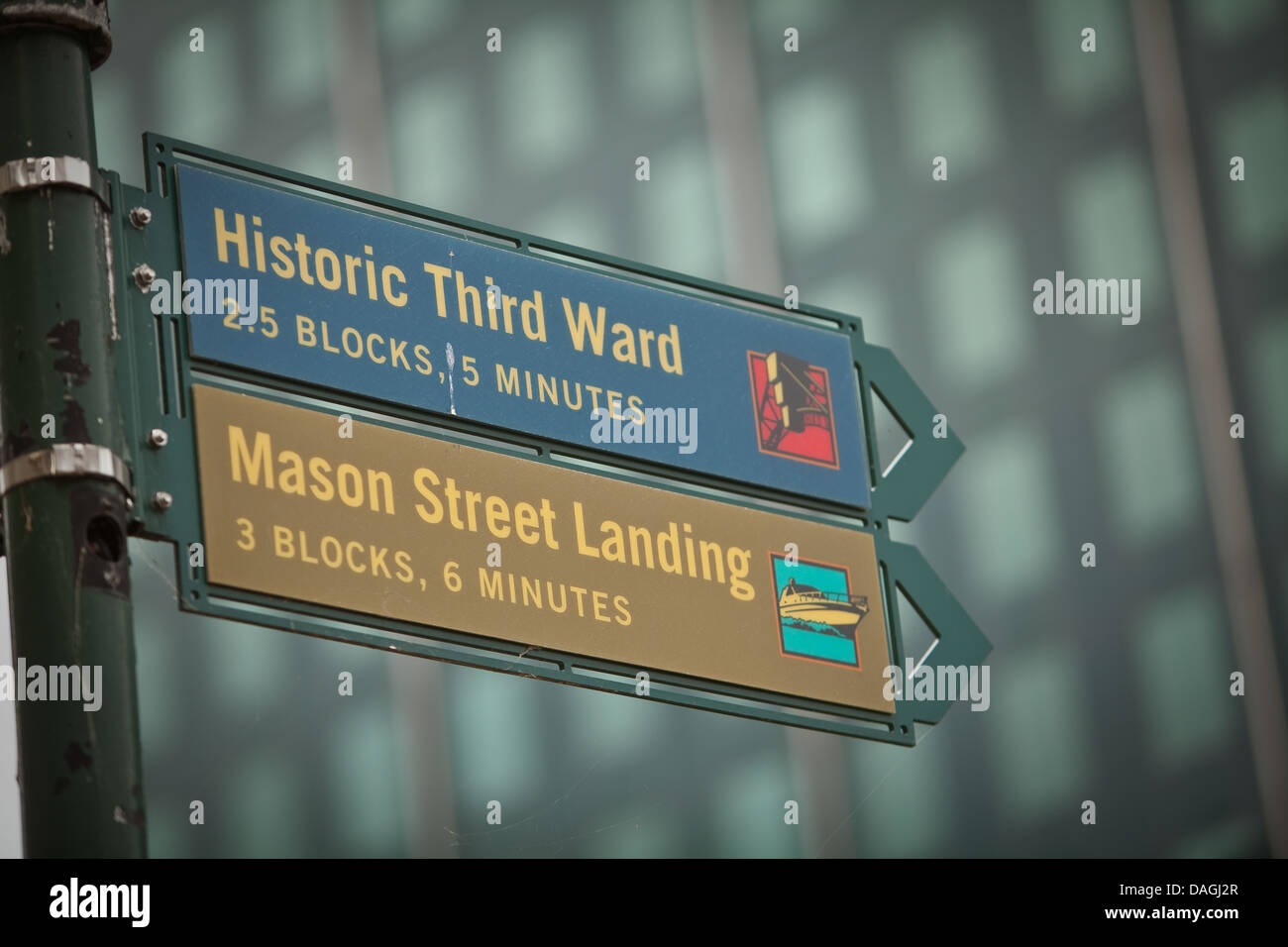 A sign points to the Historic Third Ward and the Mason Street Landing ...