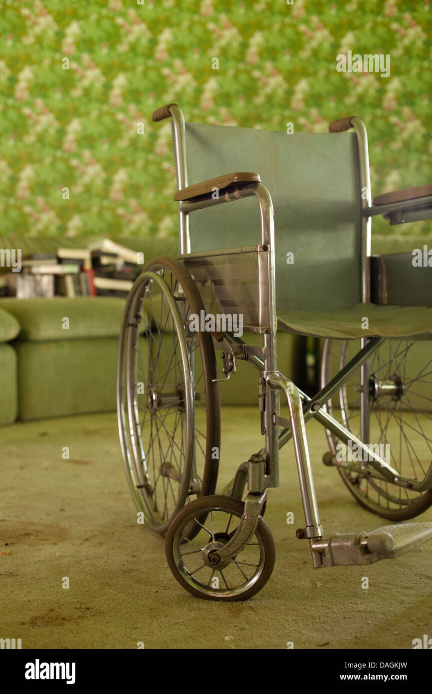 Old and dirty wheelchair in an abandoned house. Ontario, Canada Stock ...