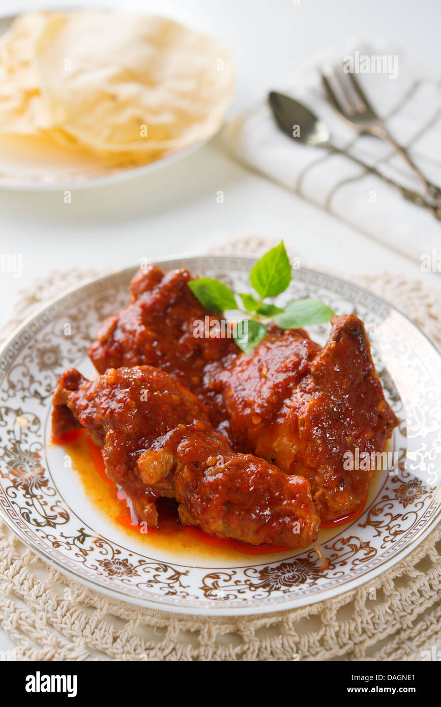 Indian curry chicken. Popular Indian dish on dining table Stock Photo ...