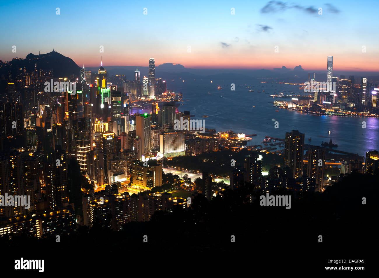 Elevated view of Hong Kong Harbour at sunset Stock Photo - Alamy