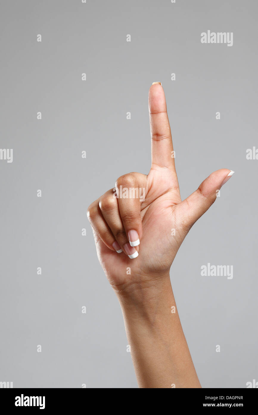 Woman's hand gesture of frame Stock Photo - Alamy
