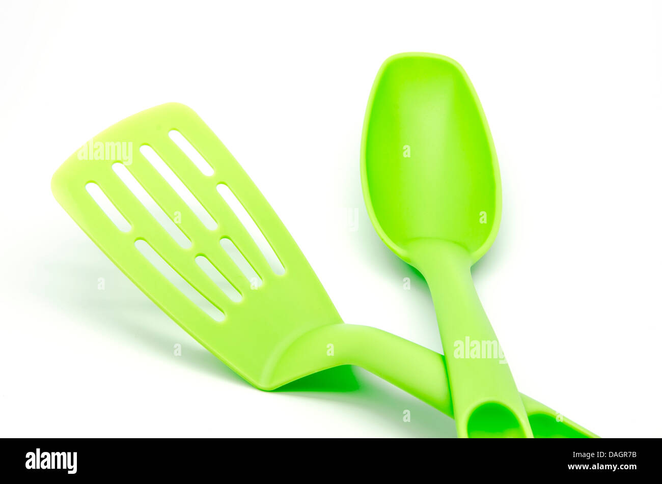 Grenn Kitchen Utensils on white background Stock Photo - Alamy
