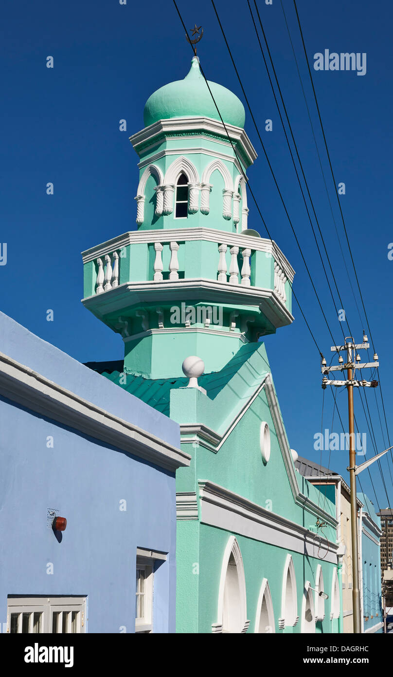 green mosque between colourful buildings in Bo-Kaap, Malay Quarter ...
