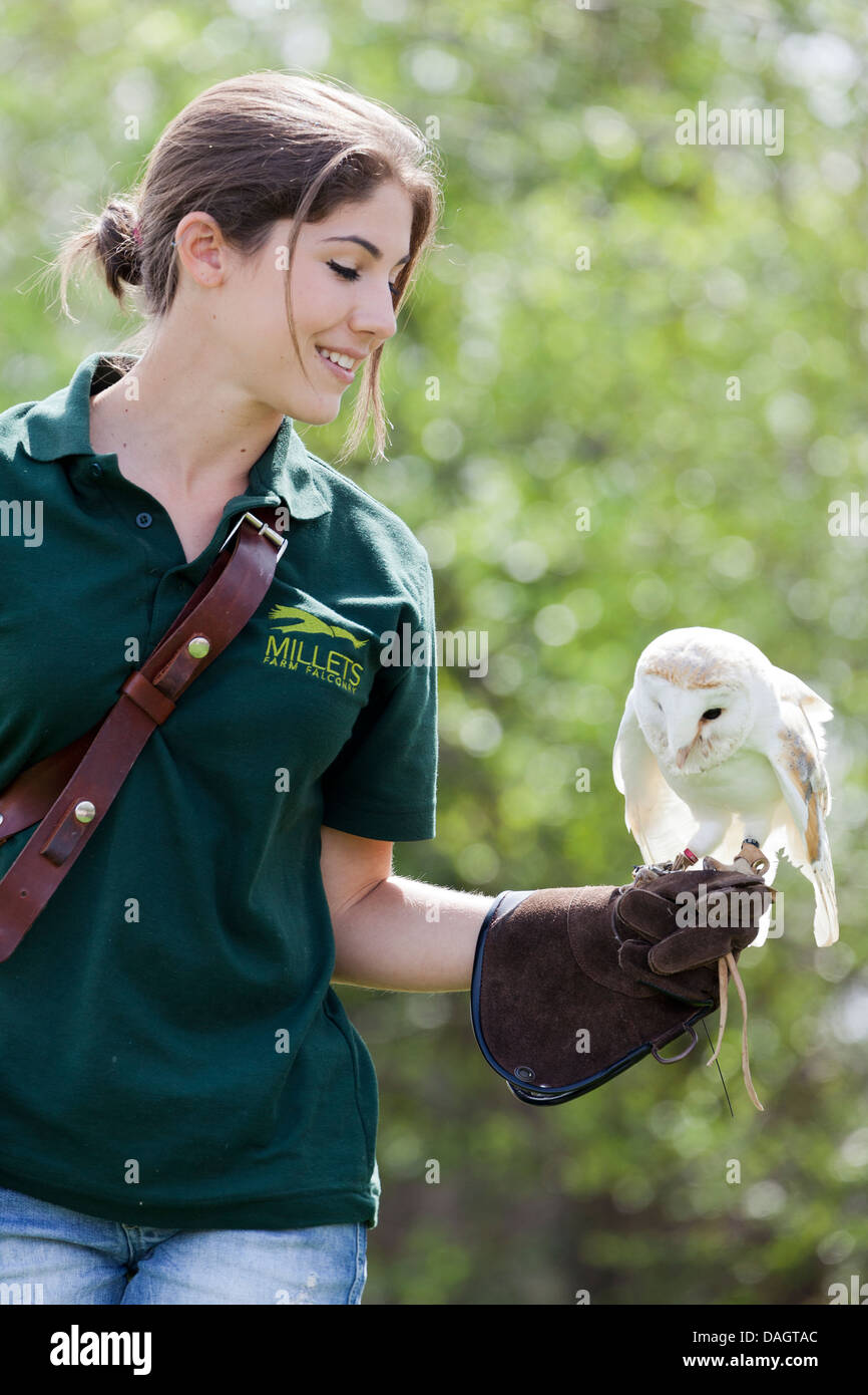 Girl holding owl hi-res stock photography and images - Alamy