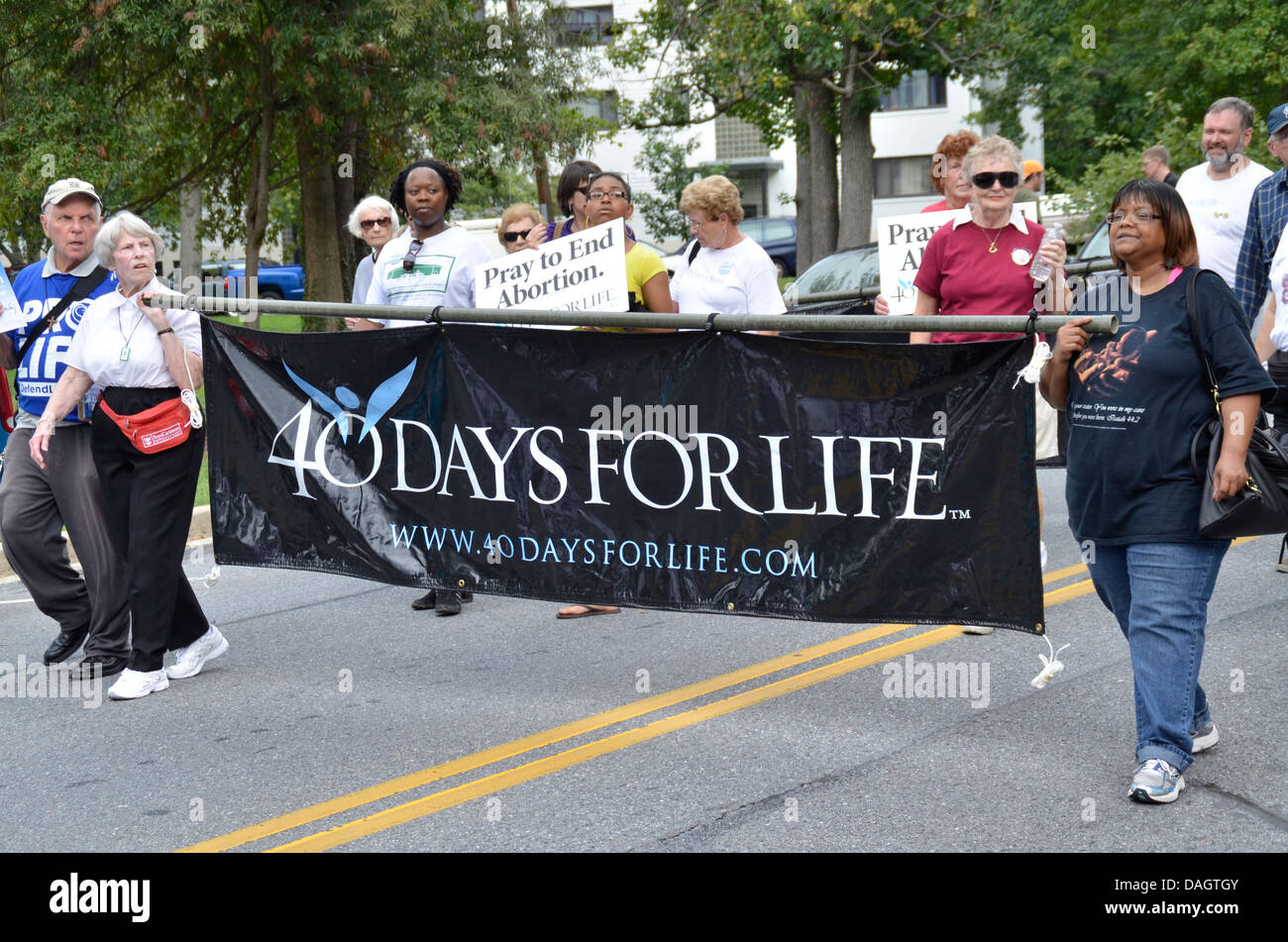 A Pro Life group marches in a Greenbelt Maryland's Labor Day Parade ...