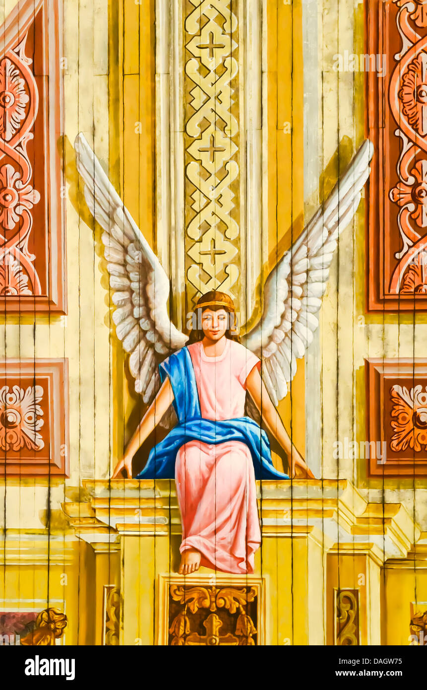 A 400-year old painting on a church ceiling depicting a guardian angel ...