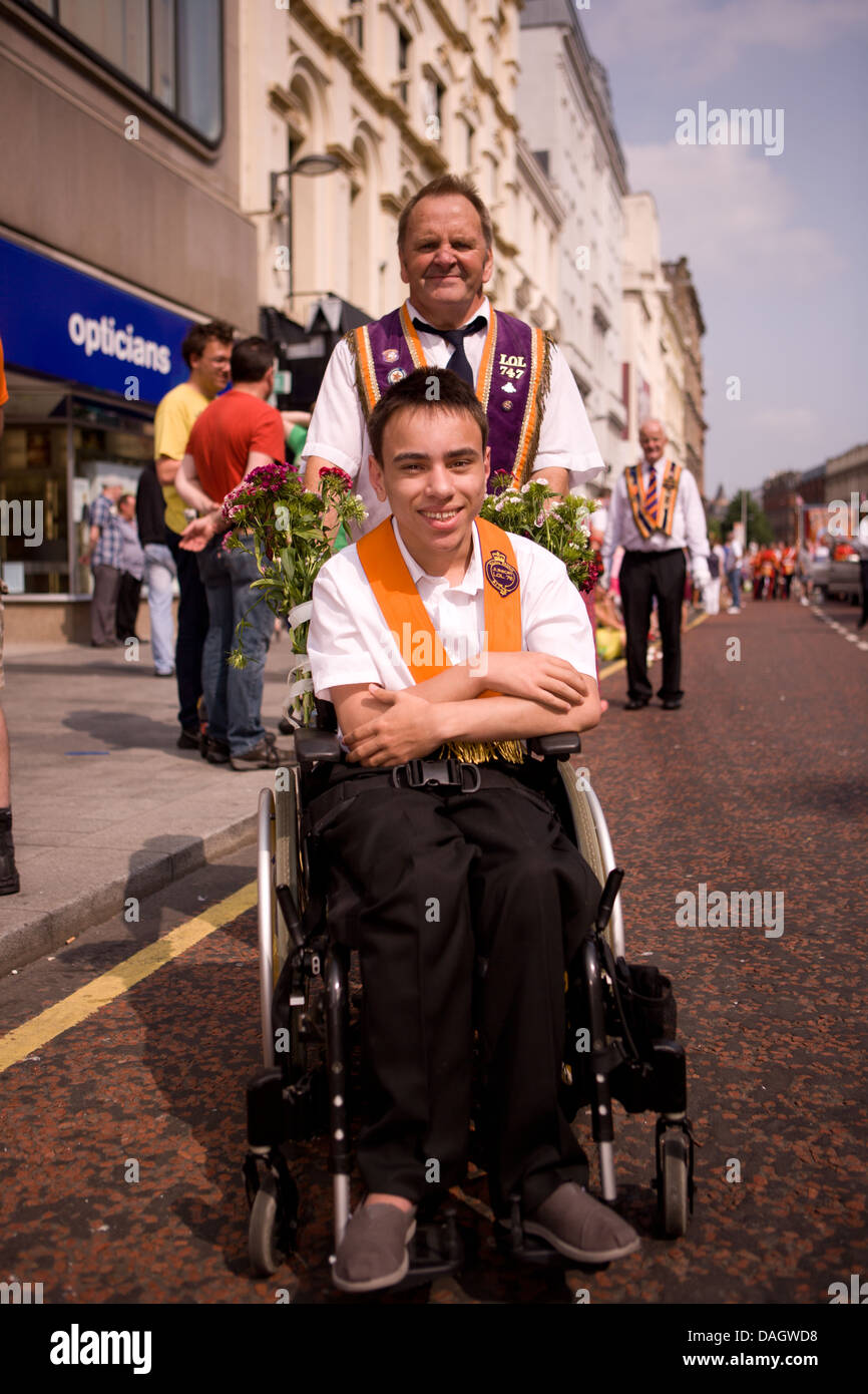 12th July 2013 Belfast, UK. A Father and Son parading during the ...