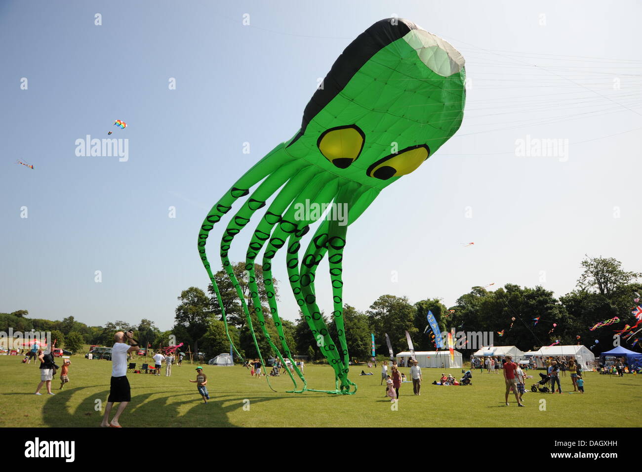 Brighton UK 13 July 2013 - Kite flyers have trouble launching this huge ...