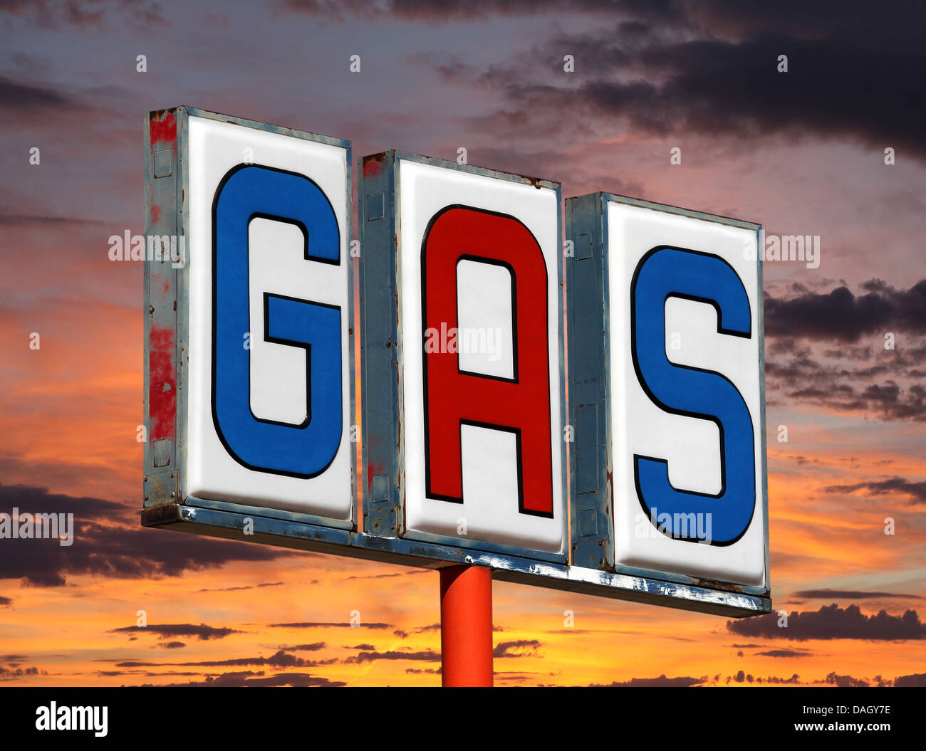 Old decayed highway gas station sign with sunset sky Stock Photo - Alamy