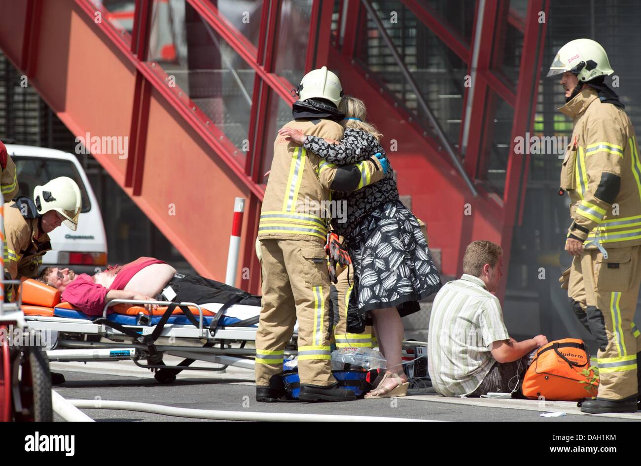 Fire fighters, rescue workers and police officers practice for an ...
