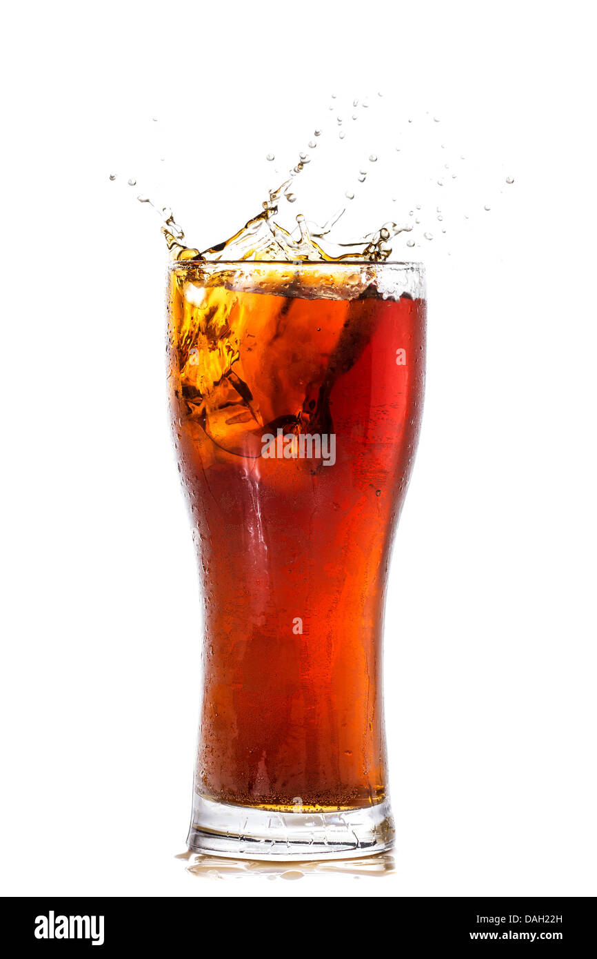 Cola glass with ice cubes over white background Stock Photo - Alamy