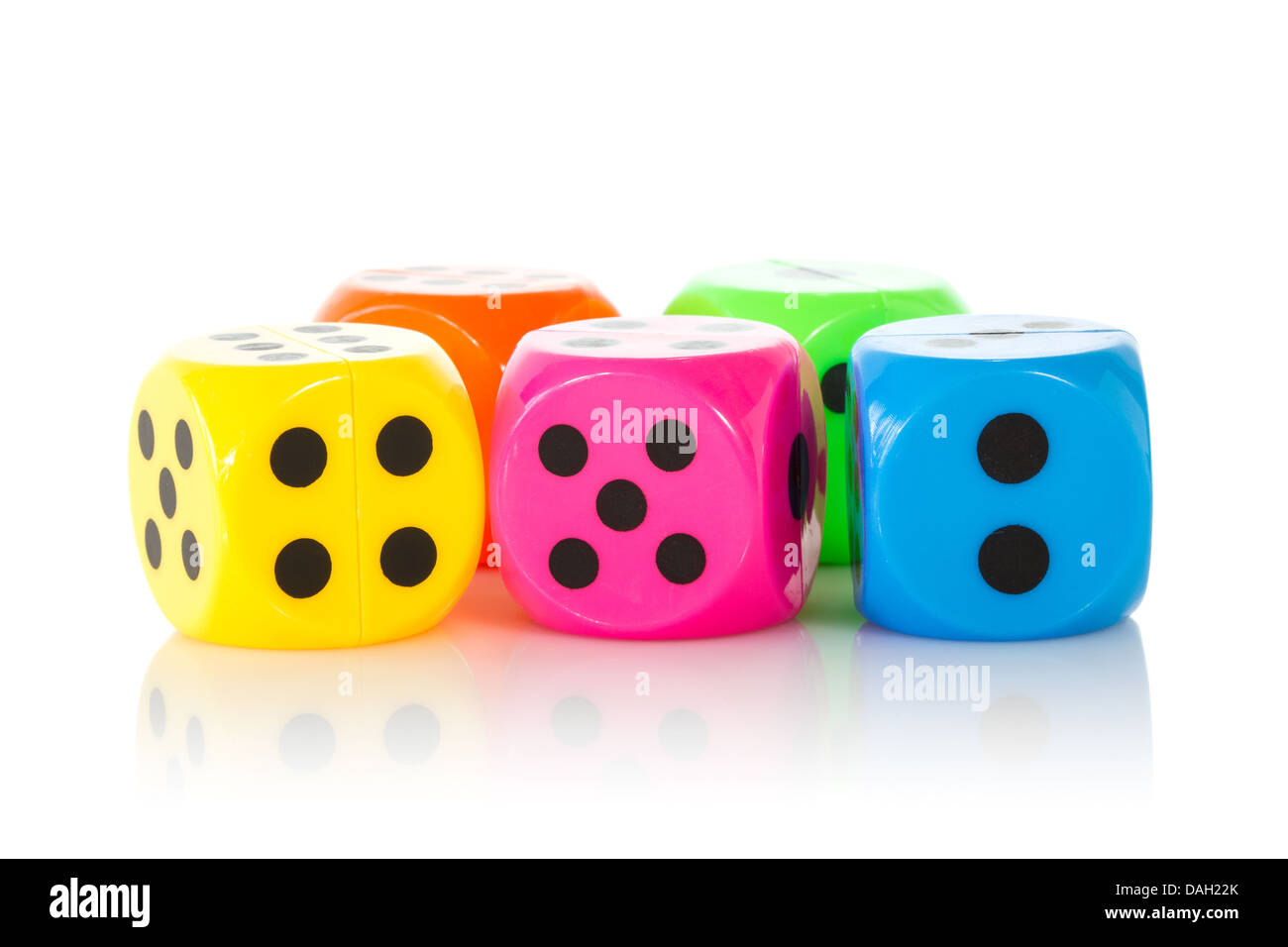 Colorful game dices isolated on white background Stock Photo - Alamy