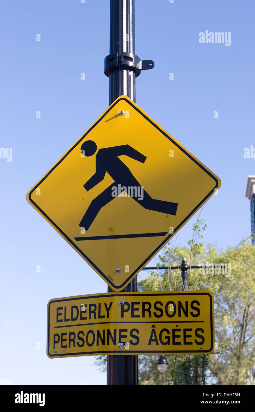 Elderly and road sign hi-res stock photography and images - Alamy