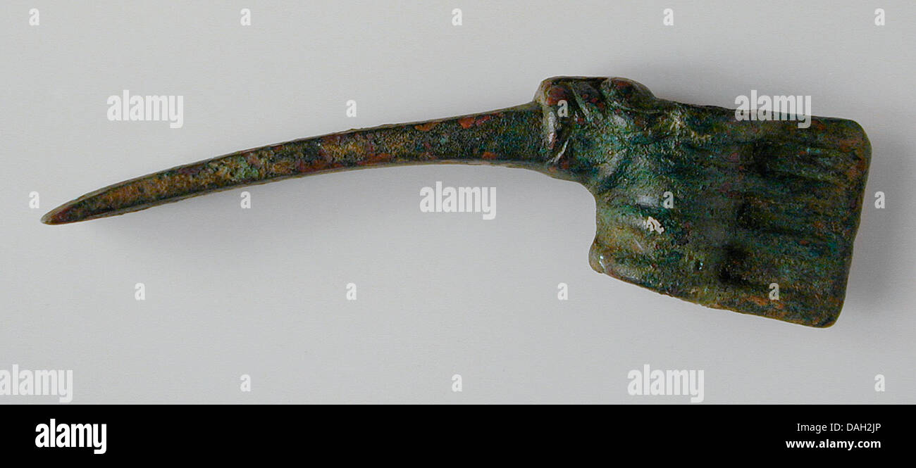 A finely crafted adze-head, used historically for woodworking. The ...