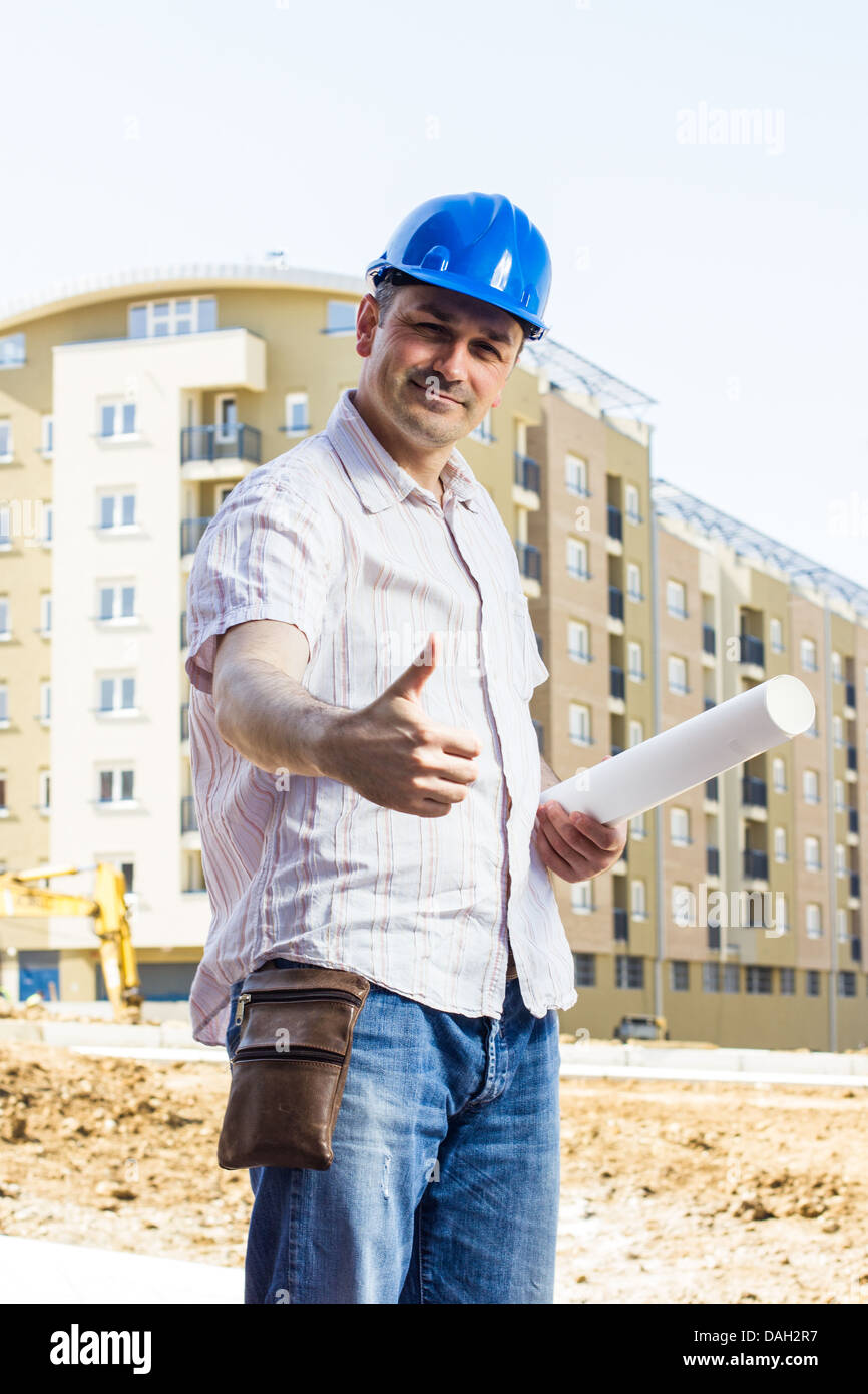 Portrait of smiling architect at construction site Stock Photo - Alamy