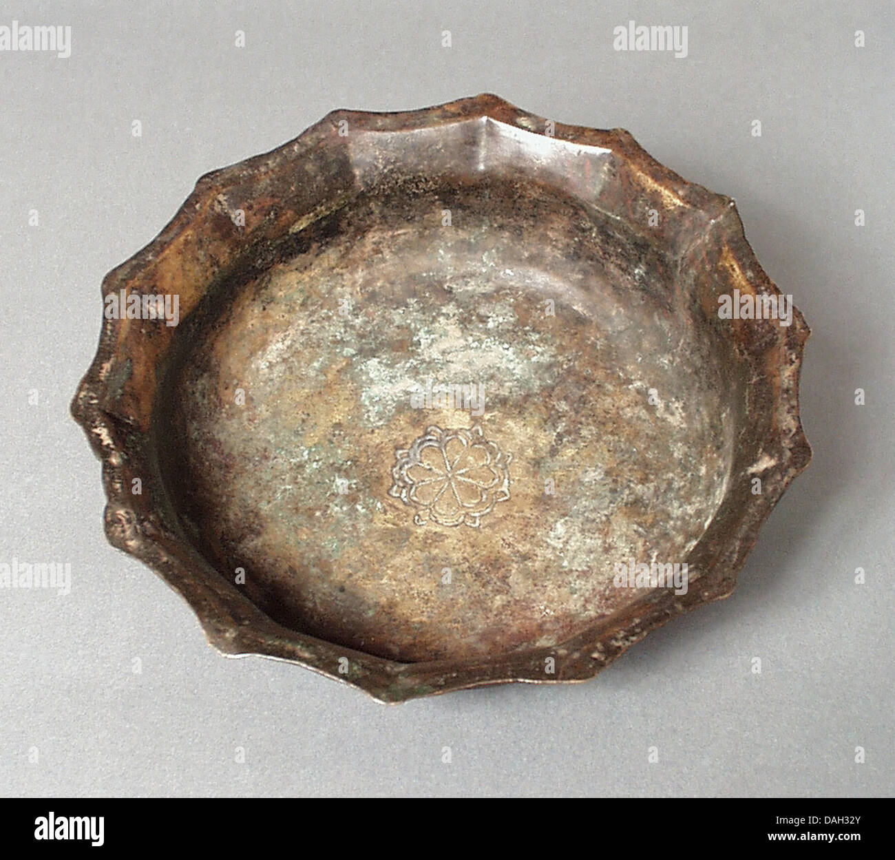 This bronze basin, part of a larger set, exemplifies the use of ancient ...
