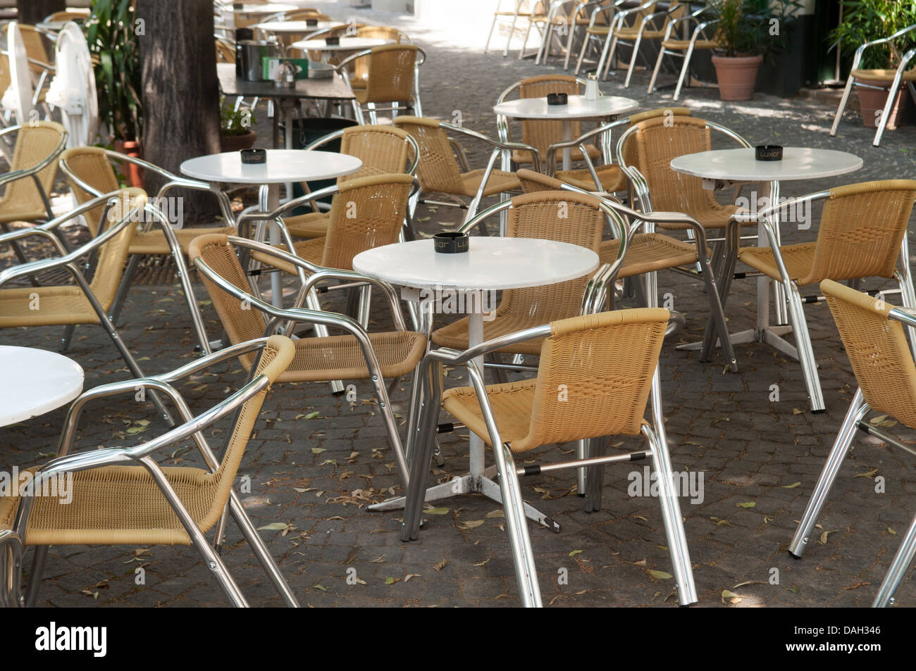 Table and wicker chairs at a cafe, Vienna, Austria Stock Photo - Alamy