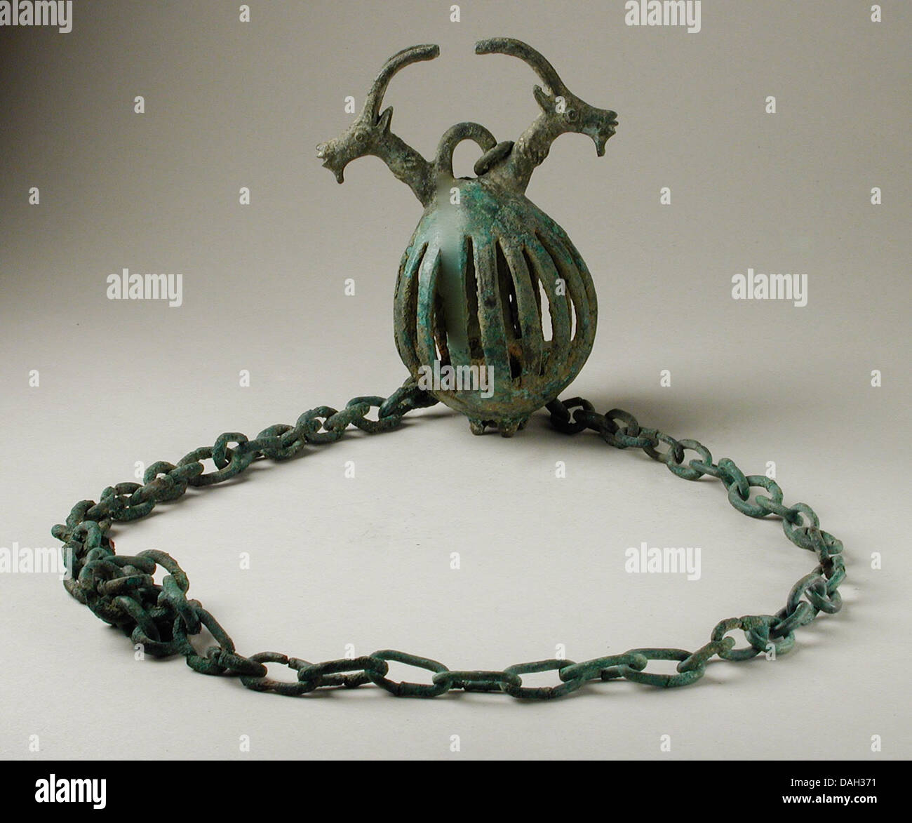 This bell, part of the collection, is a historical artifact reflecting ...