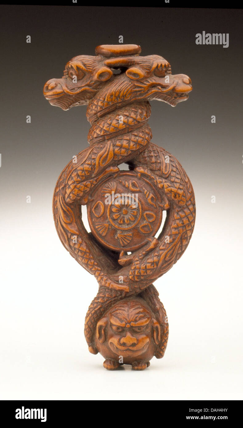 This Chinese gong, made from bronze, features intricate designs and ...