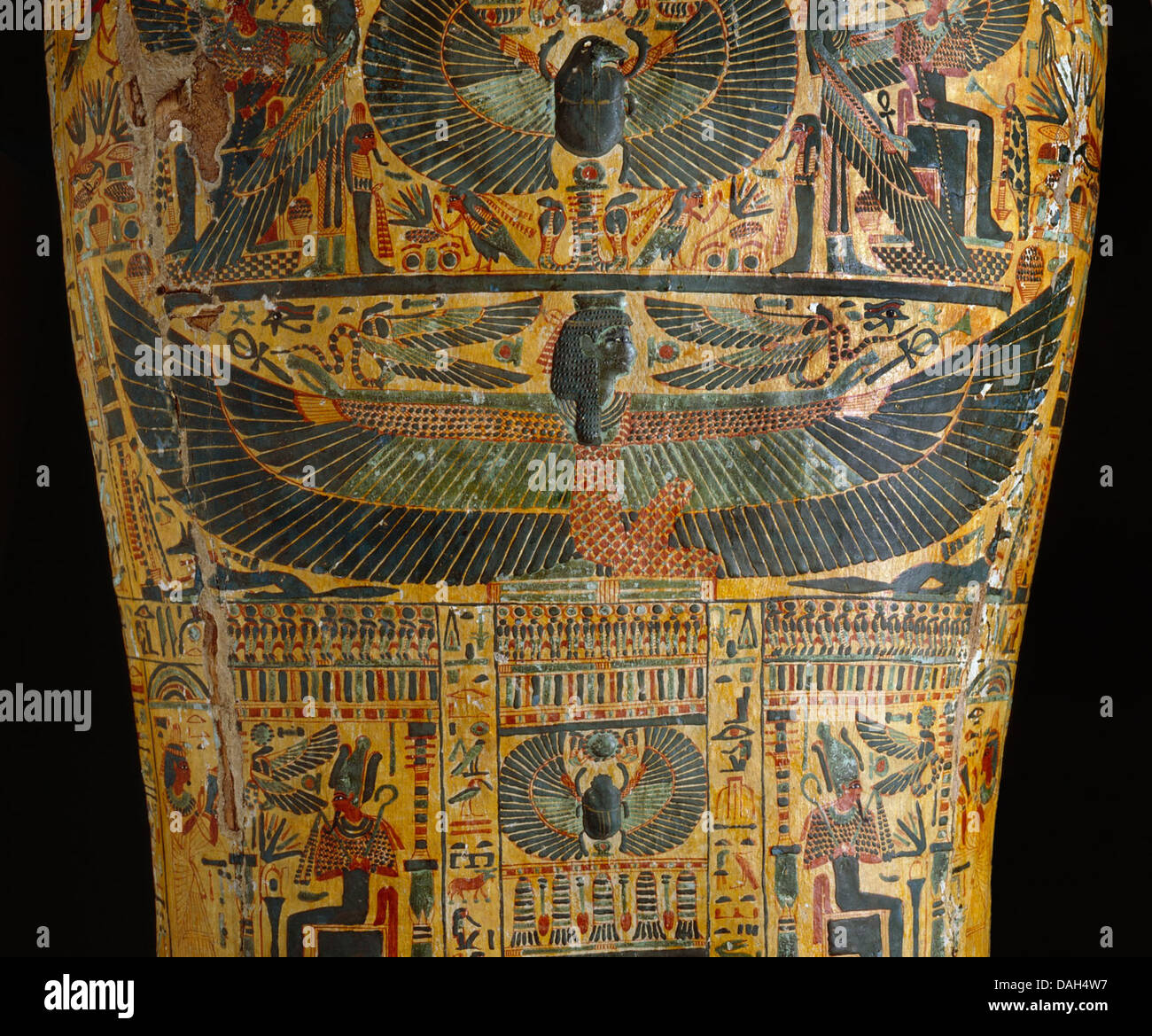 This ancient coffin, part of a burial set, features detailed ...