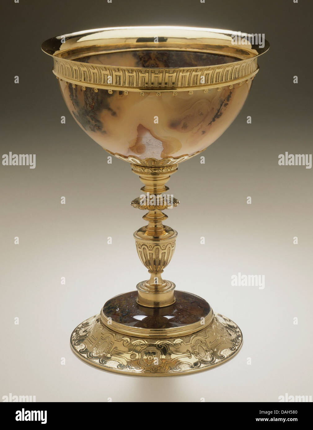 This cup represents ancient craftsmanship, likely used in ceremonial or ...